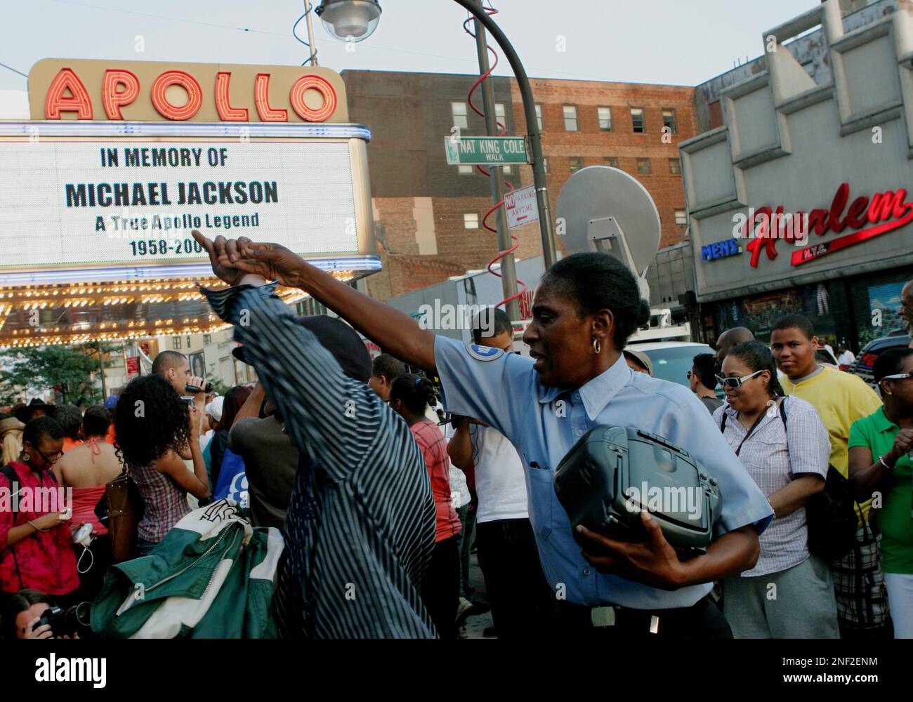 Eleanor Lewis holds on tight to her boom box as she dances to a Michael ...