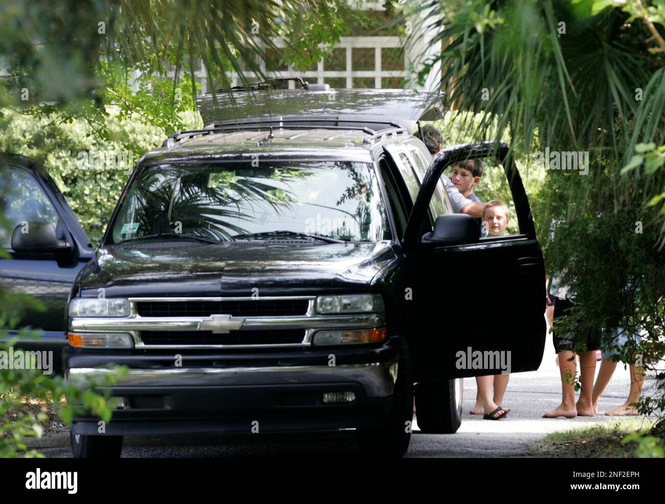 South Carolina Gov. Mark Sanford speaks to the media as he leaves the ...
