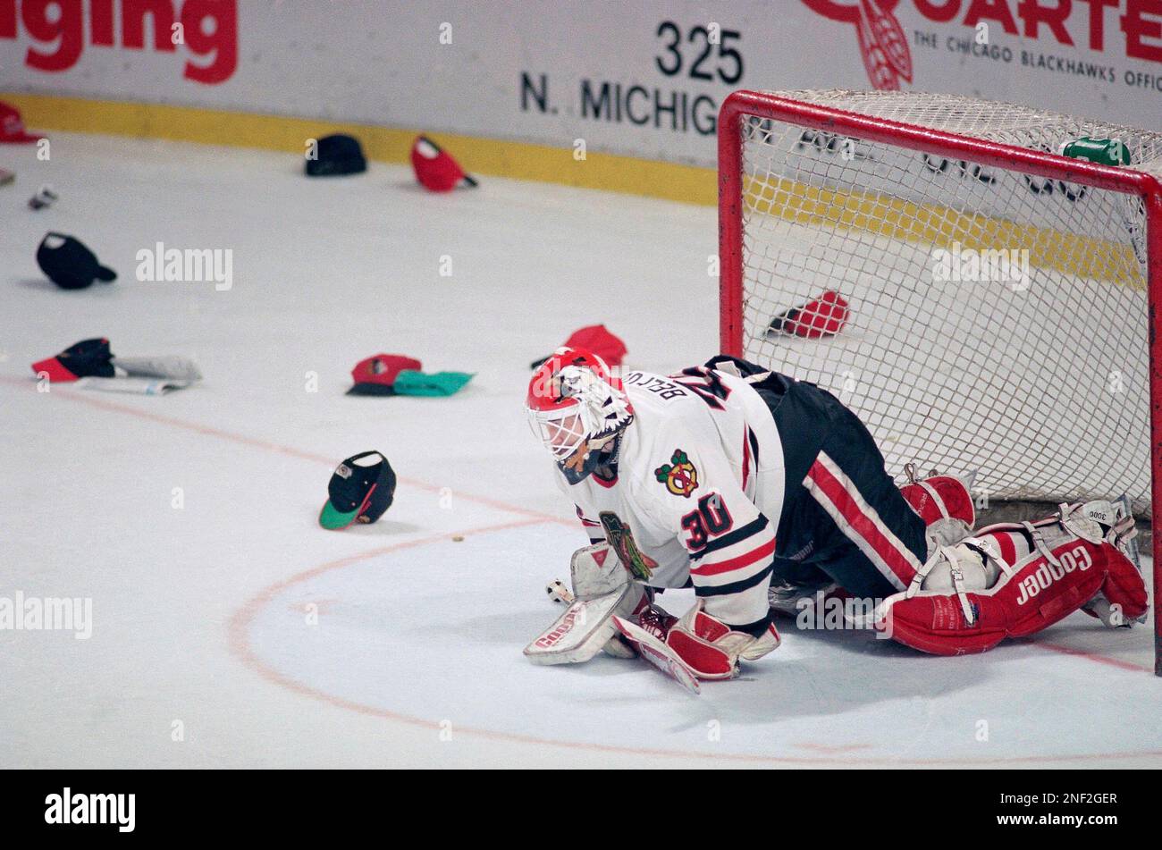 Chicago Blackhawks goalie Ed Belfour (30) stretches as hats are tossed ...