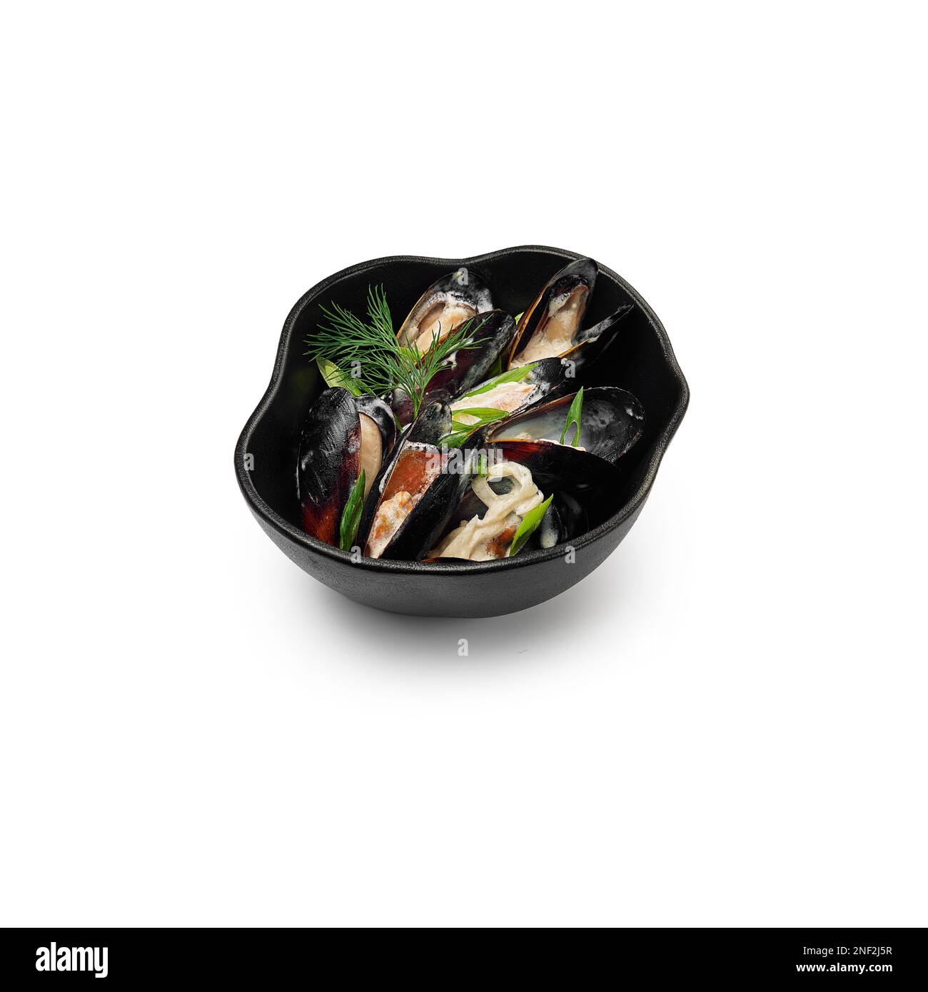 Beef Cook-Soo soup in a black bowl on a white background isolate Stock ...