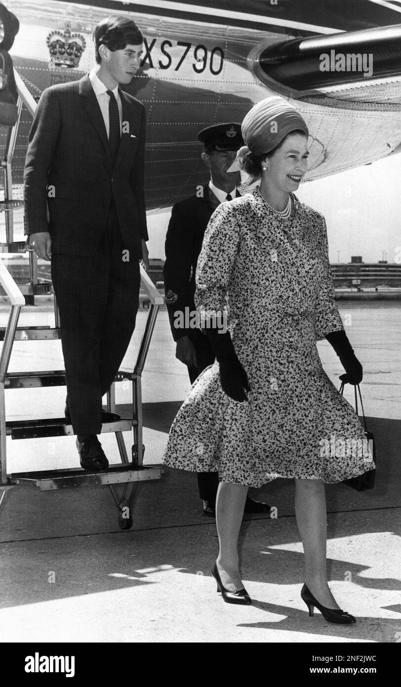 Queen Elizabeth II and Prince Charles are pictured on their return from ...