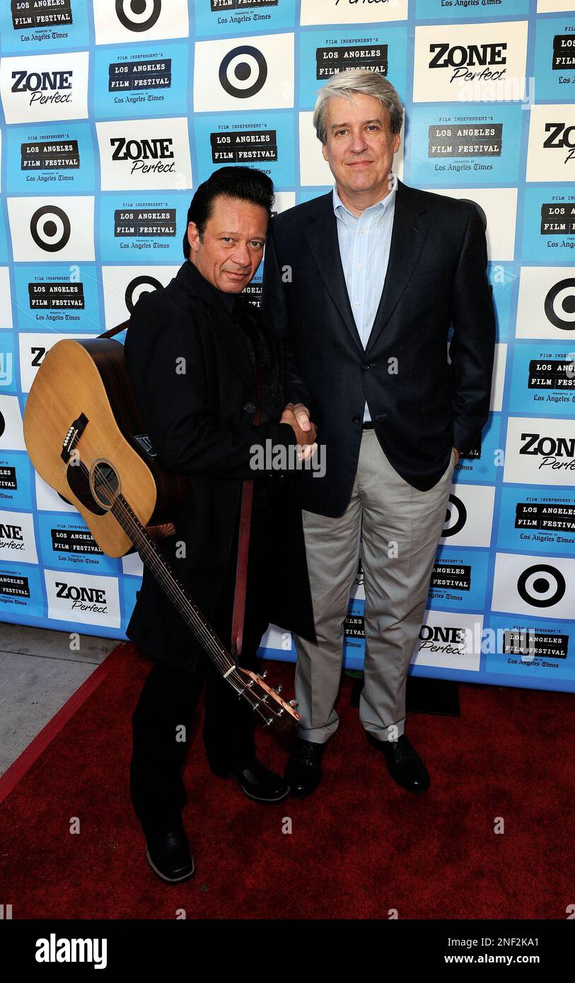 Jackson Cash, at left, and Jim Mock arrive at the world premiere of ...