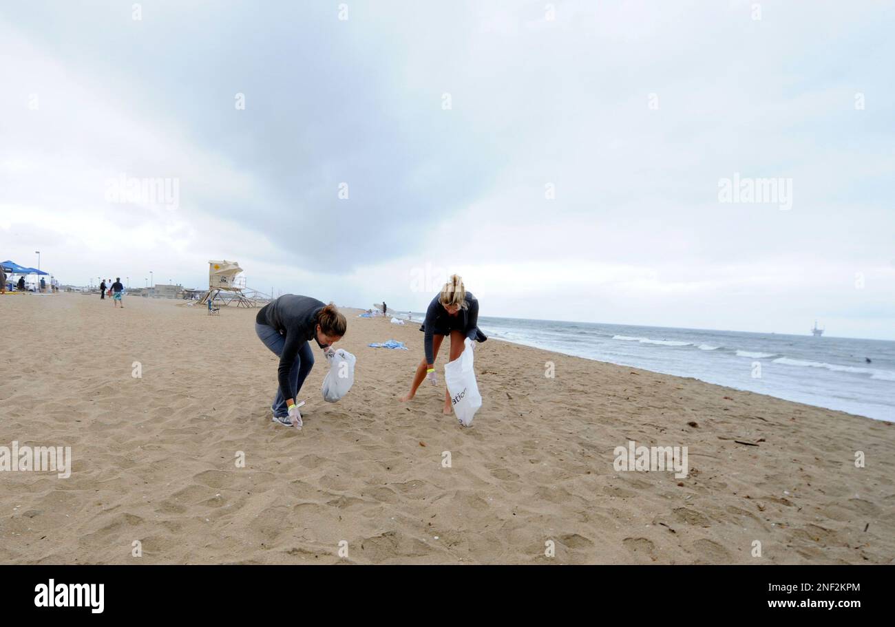 Surfers and beach clean up volunteers attend the Quicksilver Foundation ...