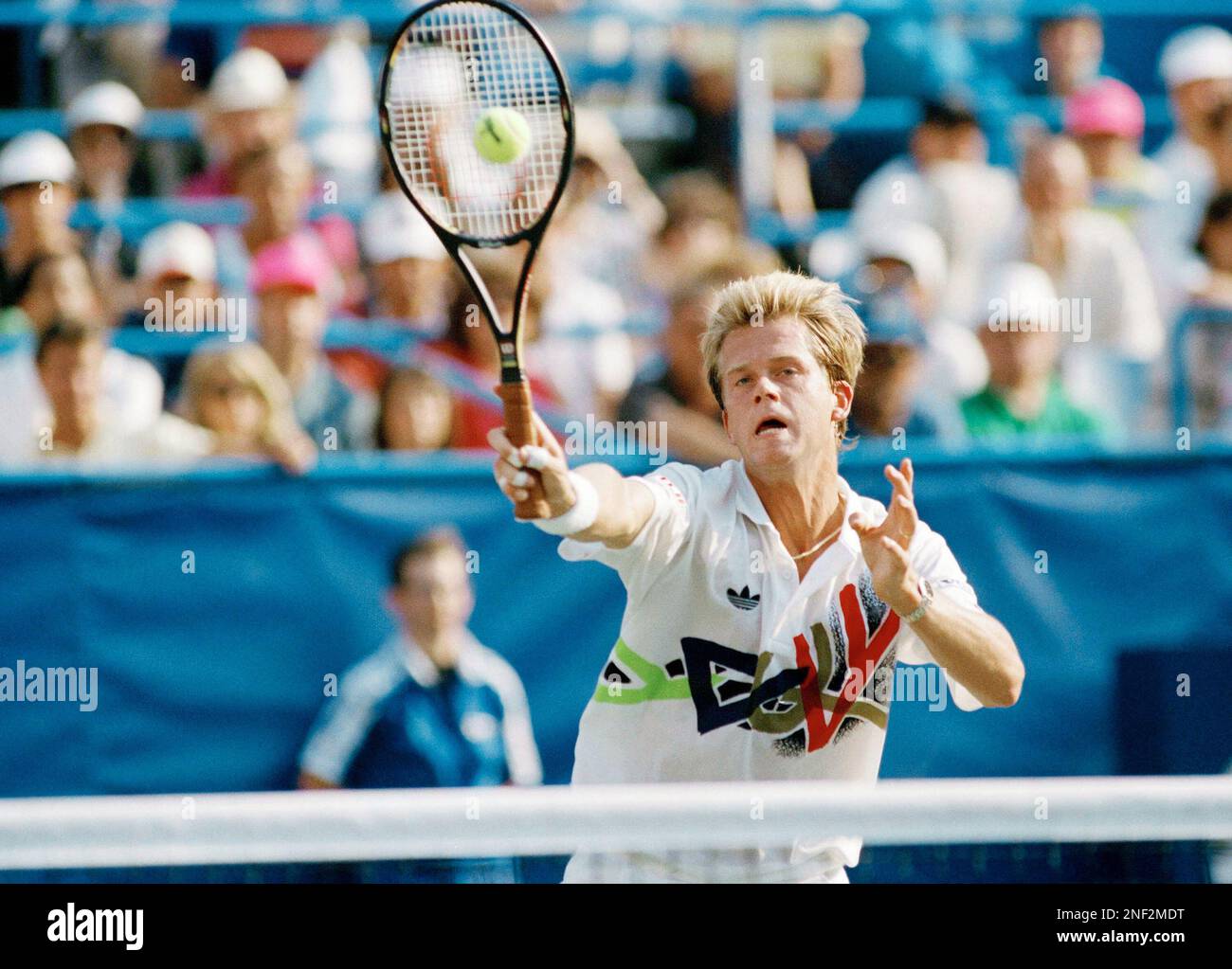 Sweden's Stefan Edberg returns to Jim Courier of Dade City, Fla ...