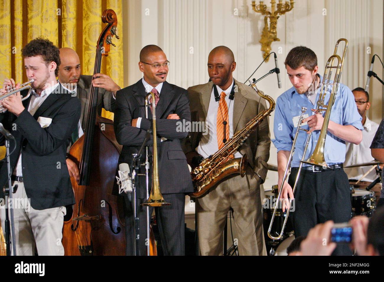 Jazz musicians Eric Revas on bass, Delfeayo Marsalis on trombone, third ...