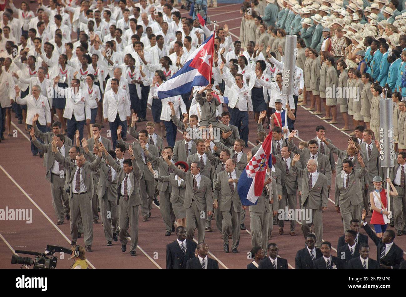 Members of the Croatian Olympic team march into Olympic Stadium ...