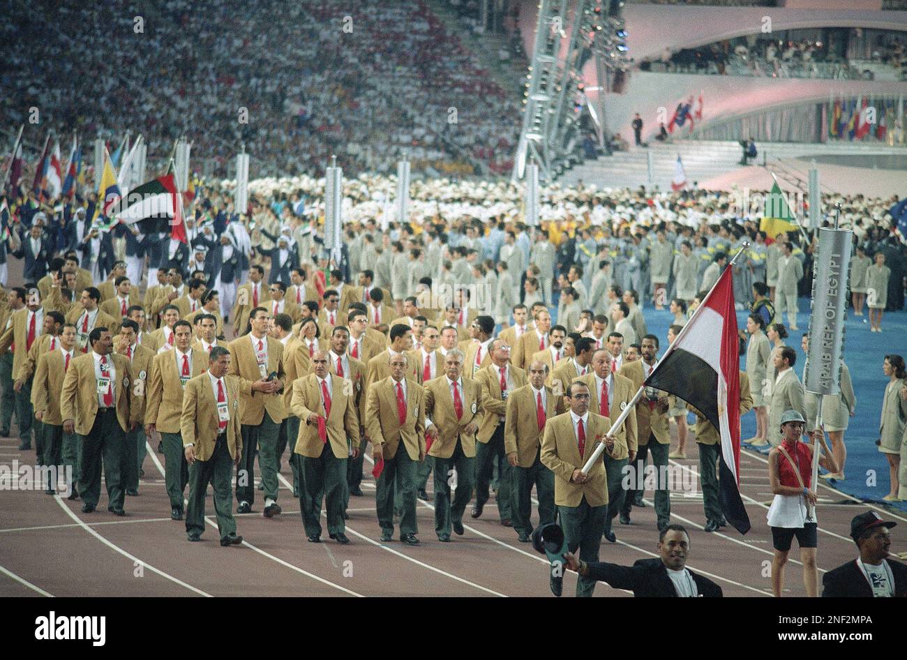 Members of Egypt's Olympic team march in Olympic Stadium in Barcelona ...