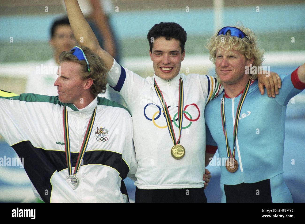 Winners of the individual sprint cycling event embrace during the ...