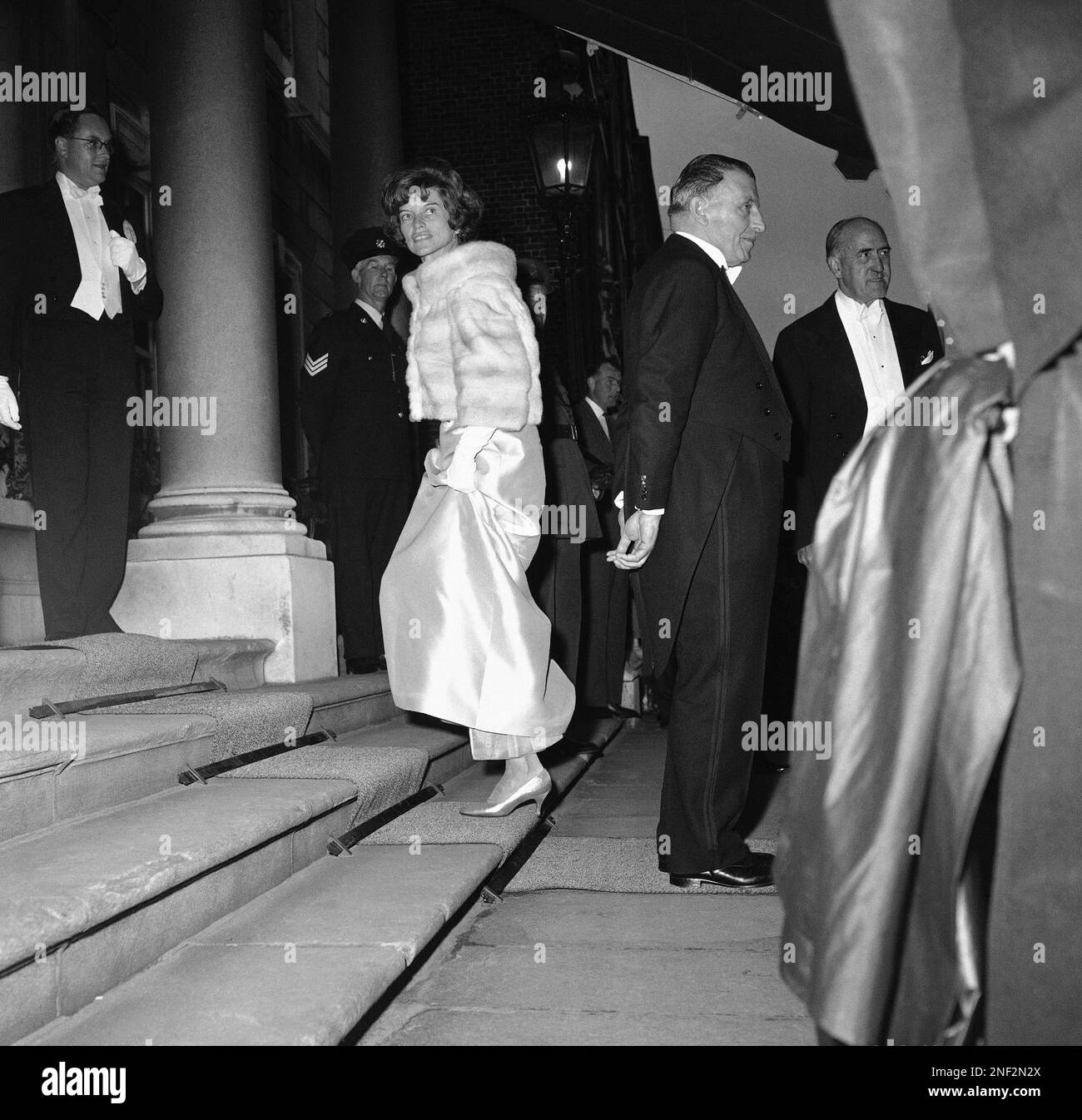Eunice Kennedy Shriver wears a fur jacket as she arrives at the home of ...