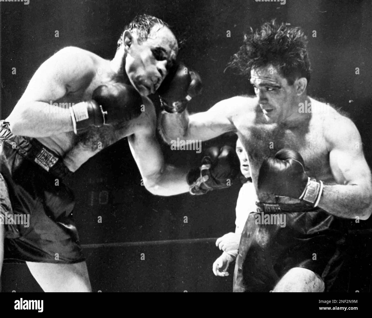 French Middleweight Boxing Champion of Europe Marcel Cerdan, right ...