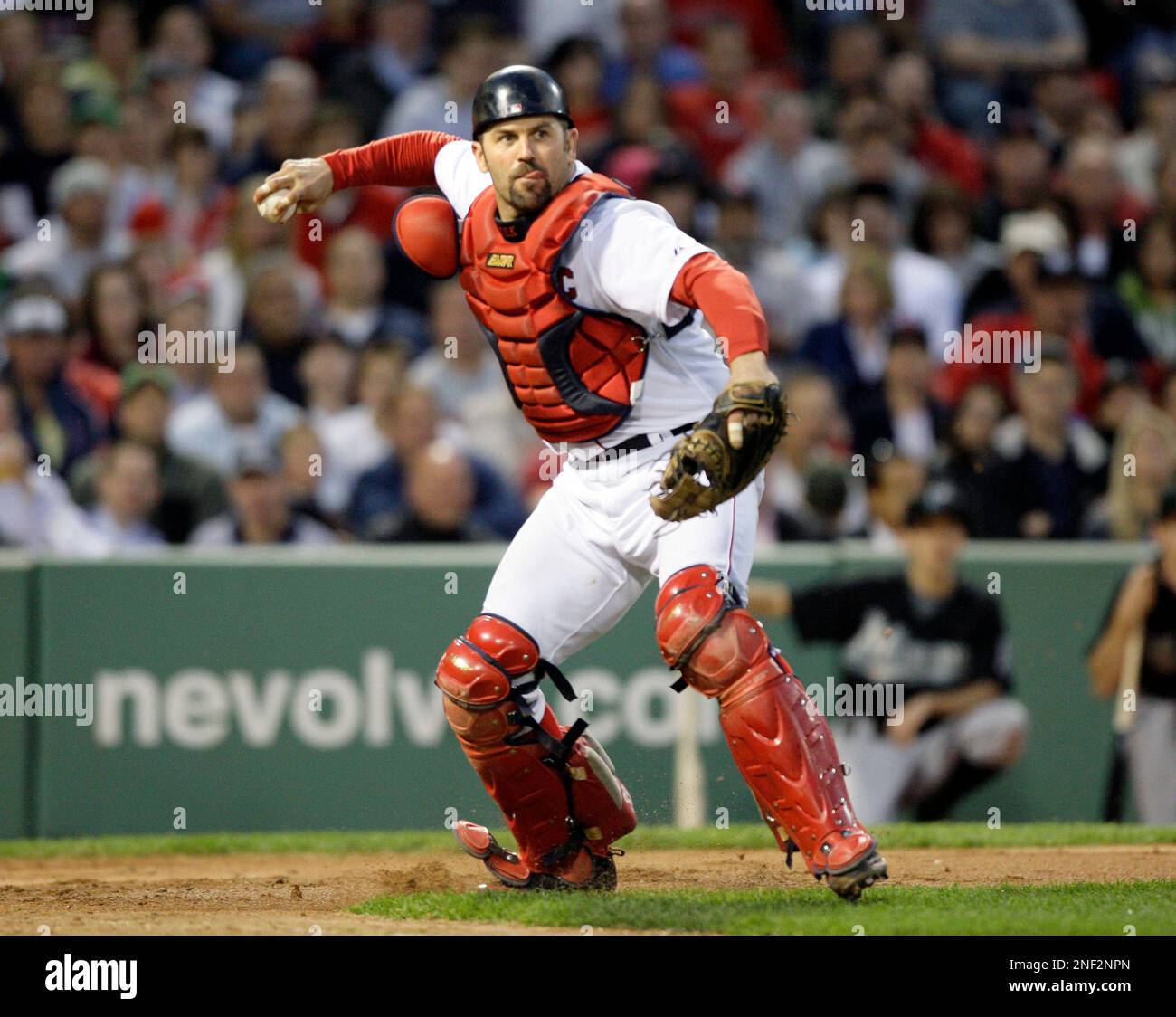 Boston Red Sox catcher Jason Varitek fields a bunt and prepares to ...