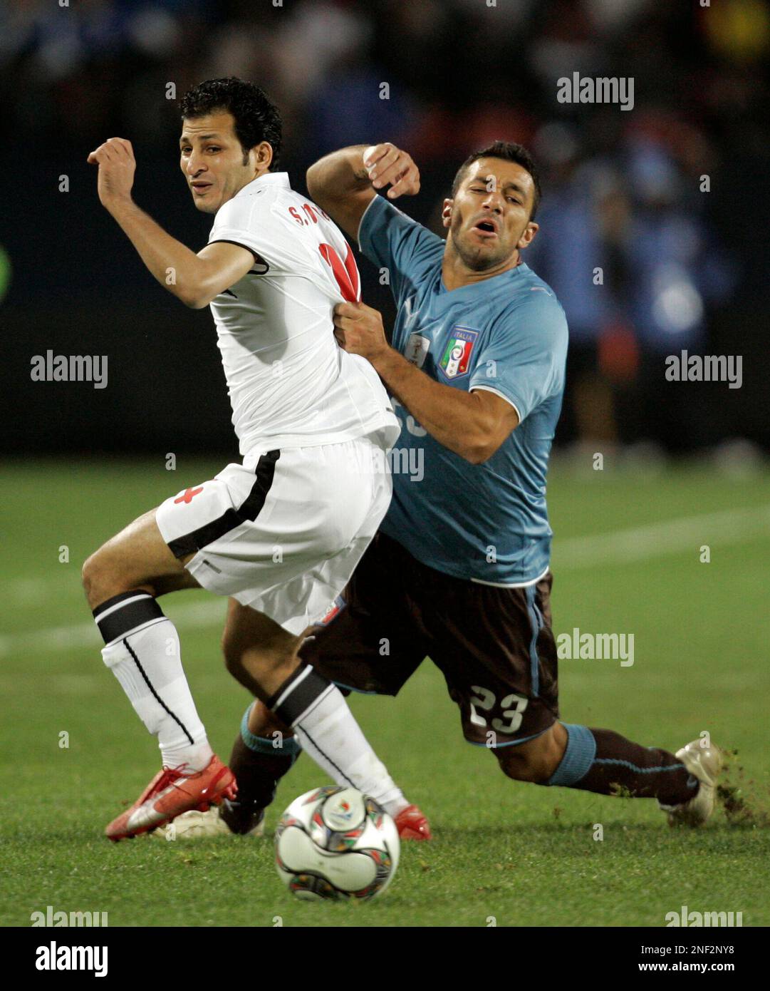 Italy's Fabio Quagliarella, right, and Egypt's Sayed Moawad vie for the ...