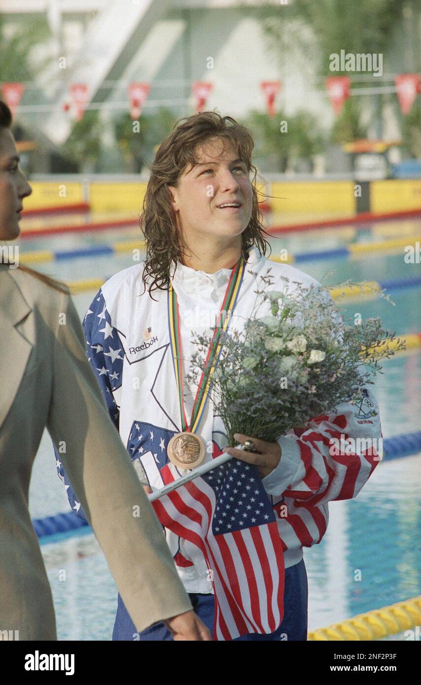 Lea Loveless of Crestwood, N.Y., looks up to the crowd after the medal ...