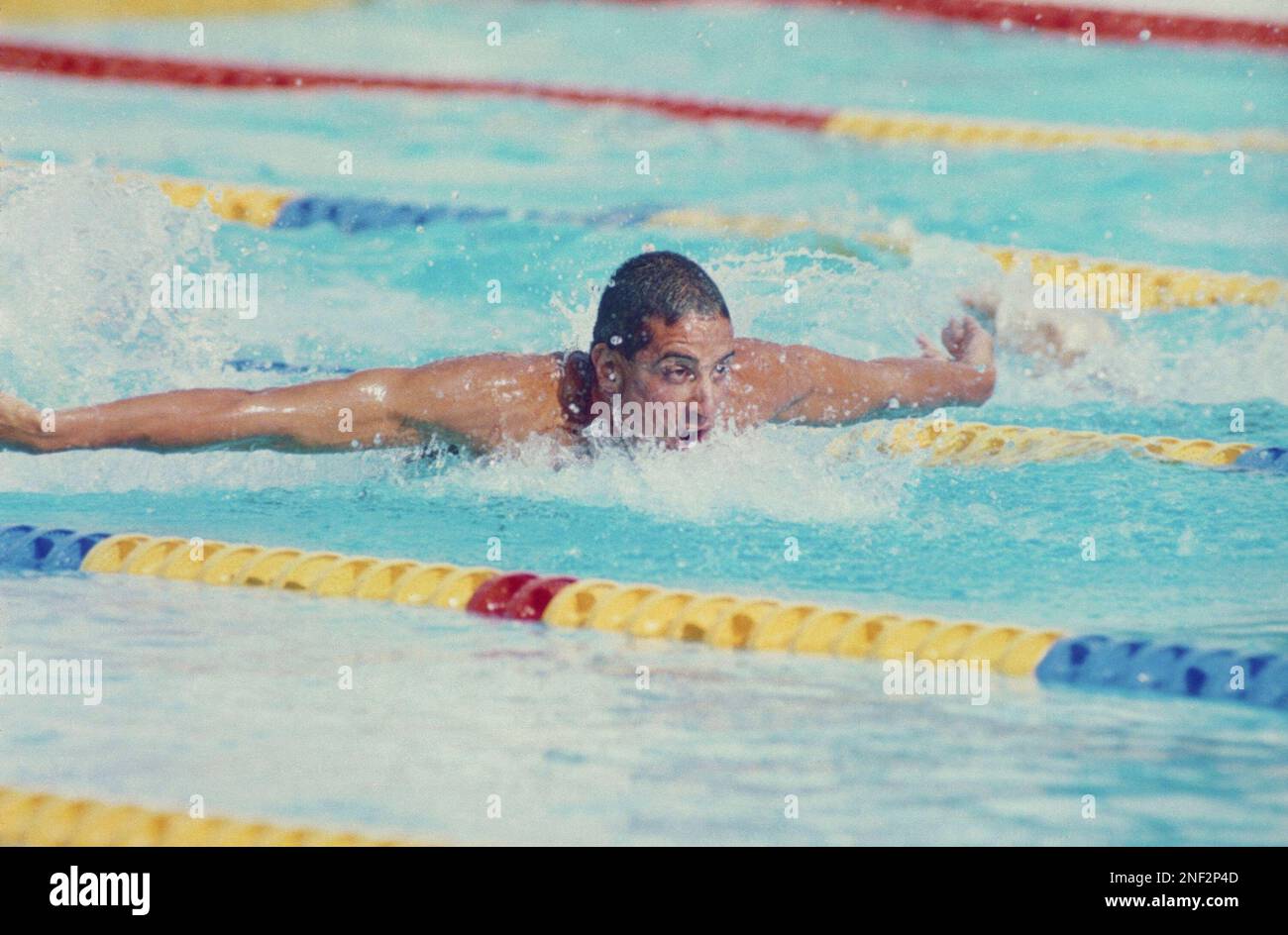 Pablo Morales of Santa Clara, Calif., swims the 100-meter butterfly to ...