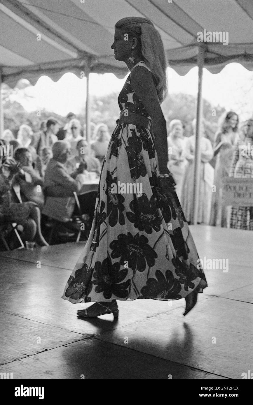 Susan Adler, wife of Richard Adler modeling blue flowered dress at a ...
