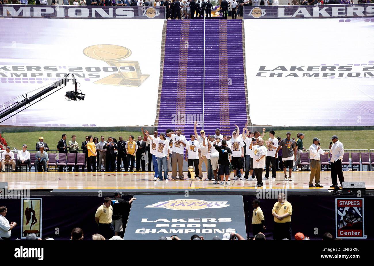 The Los Angeles Lakers celebrate on stage during their NBA basketball ...