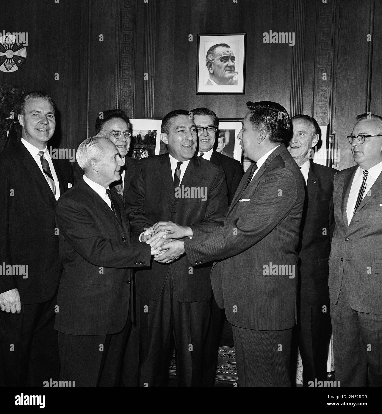 Secretary of the Interior Stewart Udall congratulates two Montana men ...
