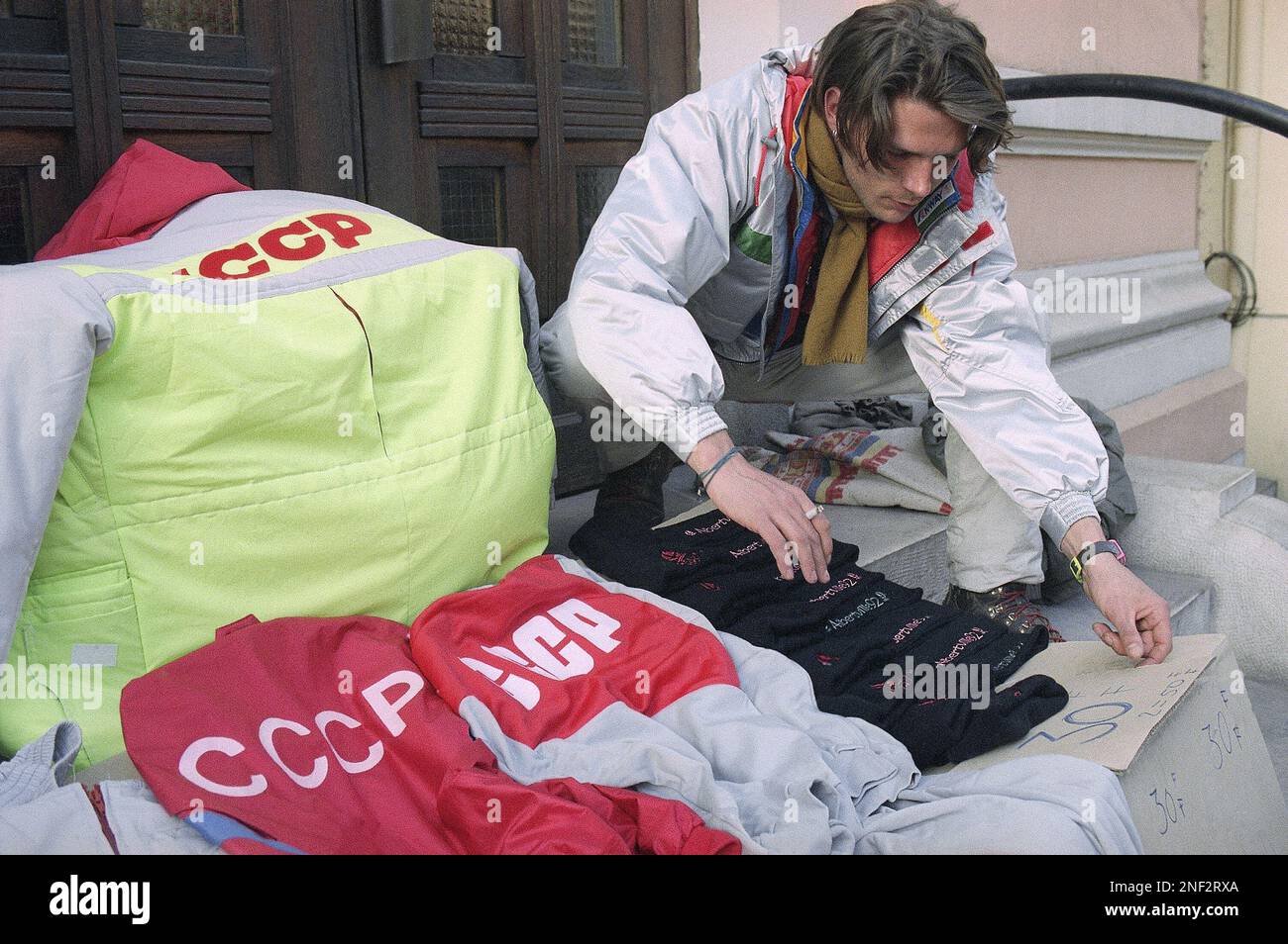 Tom Low of Holland arranges Unified Team warm-up suits that he is ...