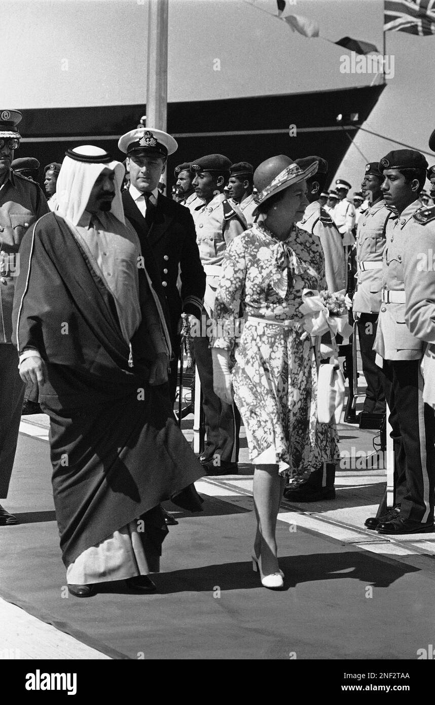 Accompanied by the Emir of Qatar, Khalifa bin Sheik Hamad Al Thani ...