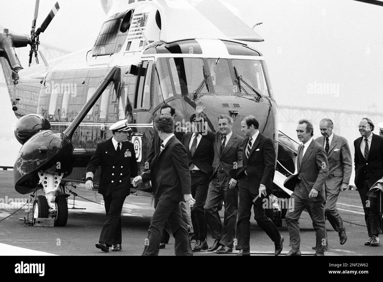 Vice President Walter Mondale waves to the crowd aboard the aircraft ...