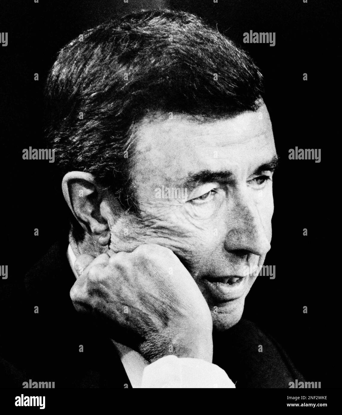 Jerry Mason general manager of Morton Thiokol, rests his head on his ...