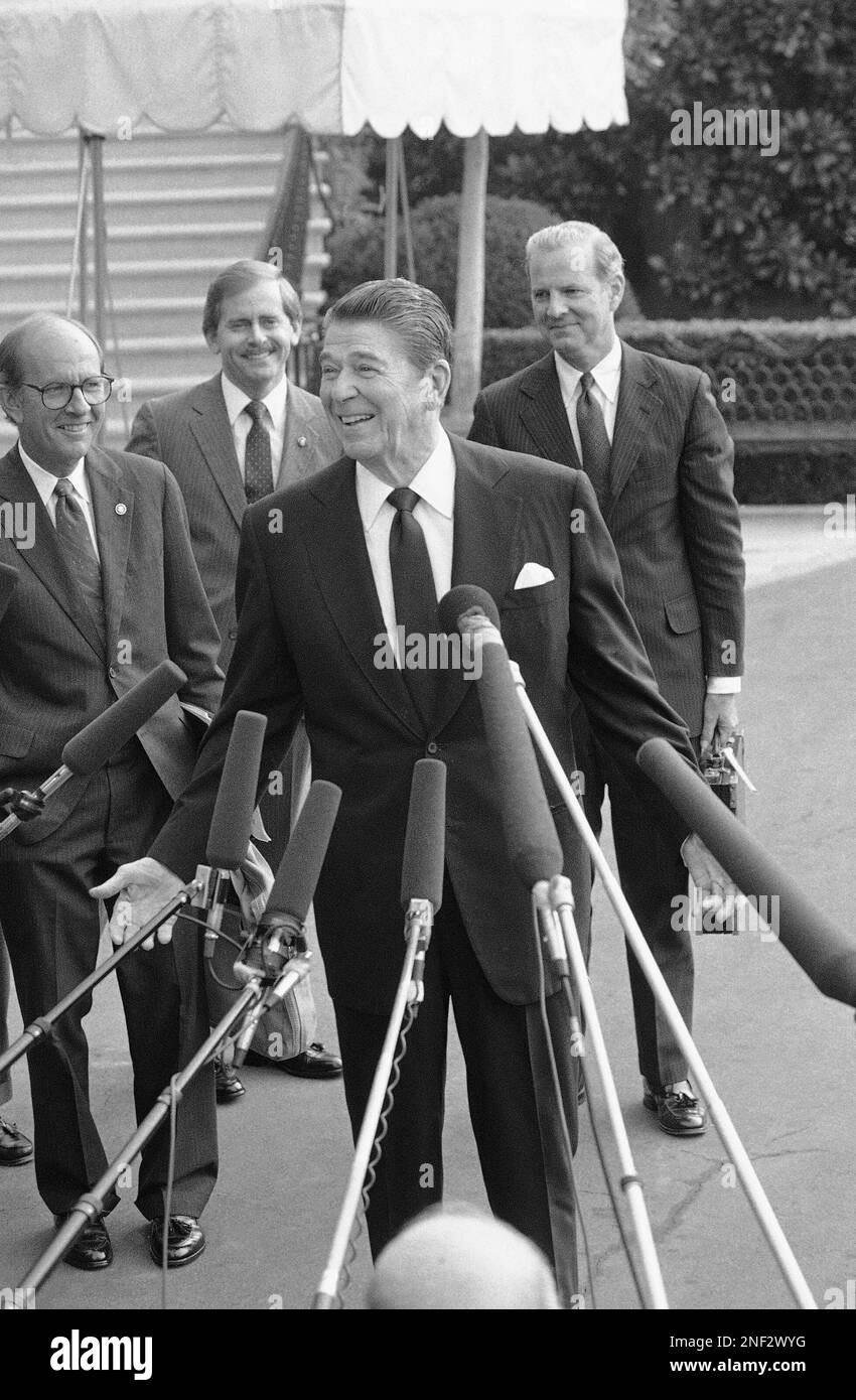 President Ronald Reagan talks with reporters Wednesday, Oct. 10, 1984 ...