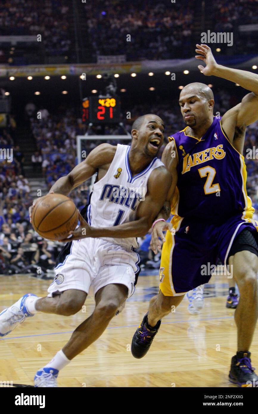 Orlando Magic's Rafer Alston (1) drives on Los Angeles Lakers' Derek ...
