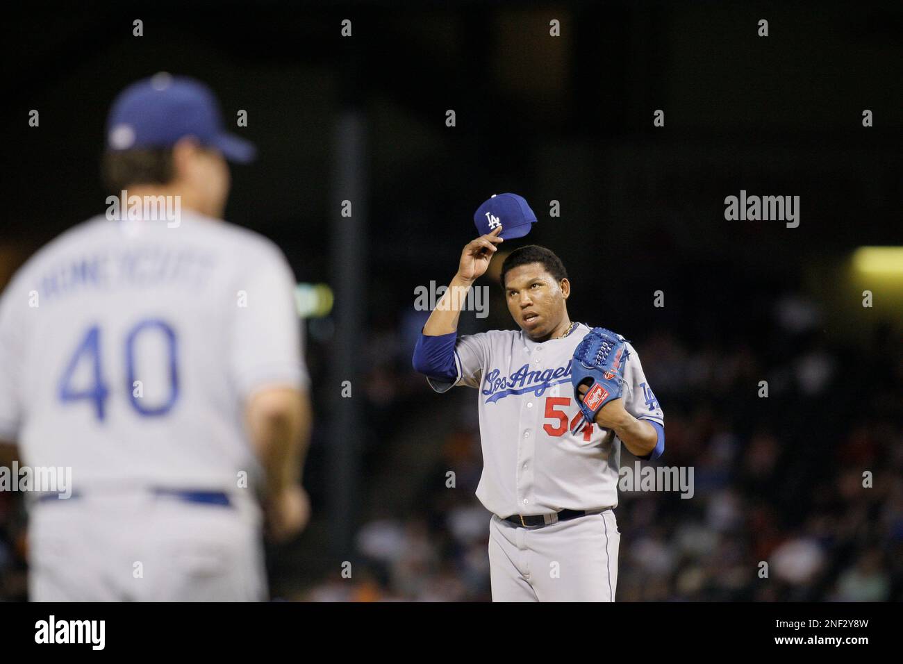 Los Angeles Dodgers pitcher Ronald Belisario, right, and pitching coach ...