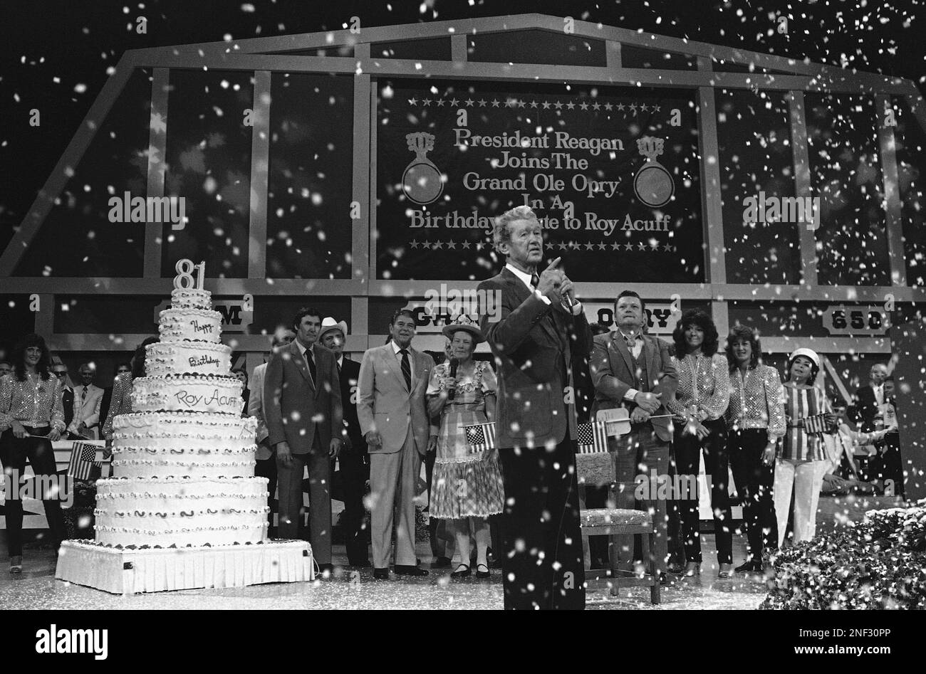 Amid a shower of confetti, Country Music Star, Roy Acuff, talks to the ...