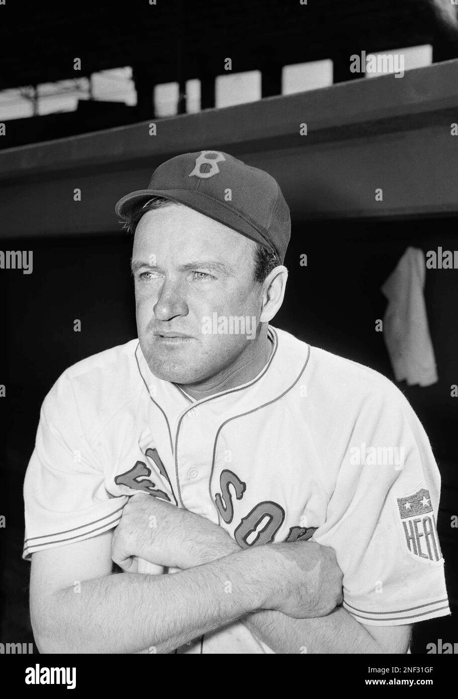 Manager Joe Crowin of Boston Red Sox sits on bench this year and direct ...
