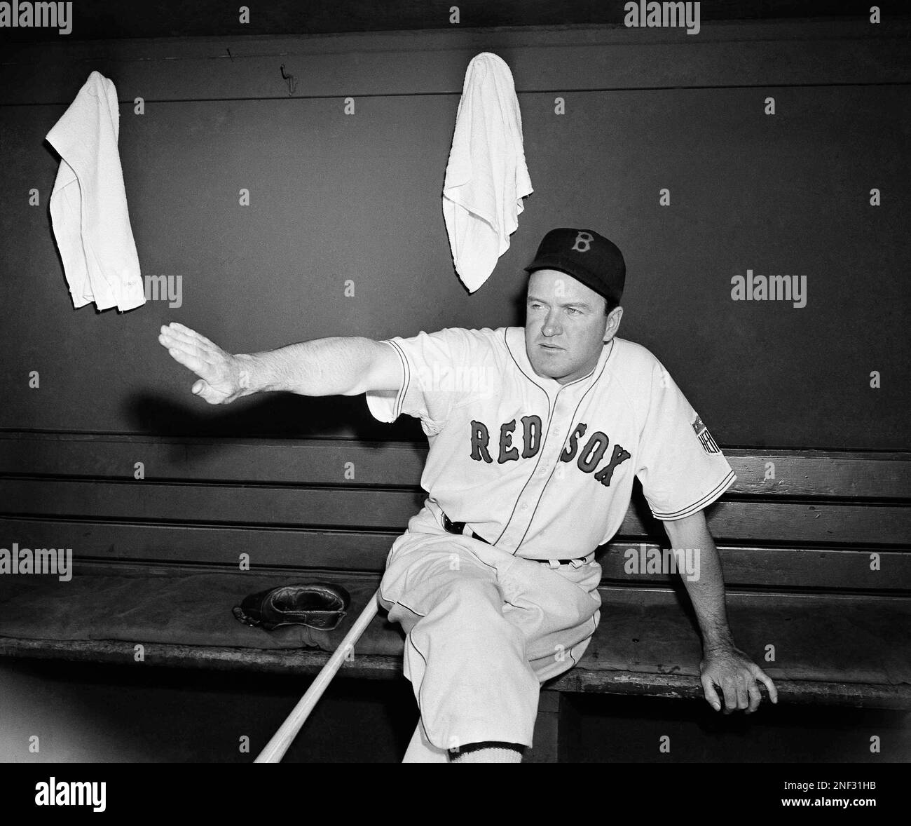 Manager Joe Crowin of Boston Red Sox sits on bench this year and direct ...
