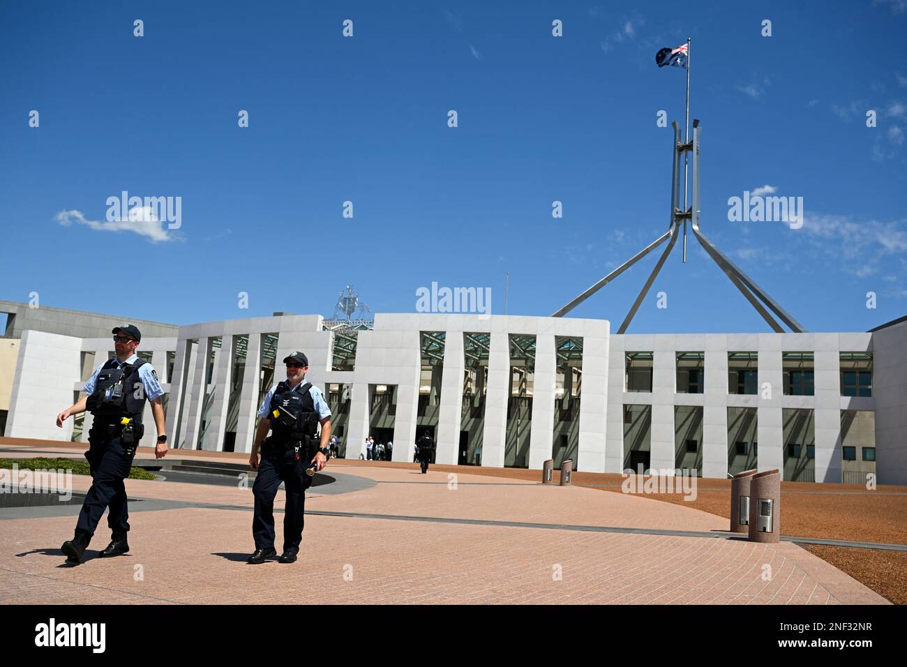 Police Officer are seen outside Parliament House in Canberra, Friday ...
