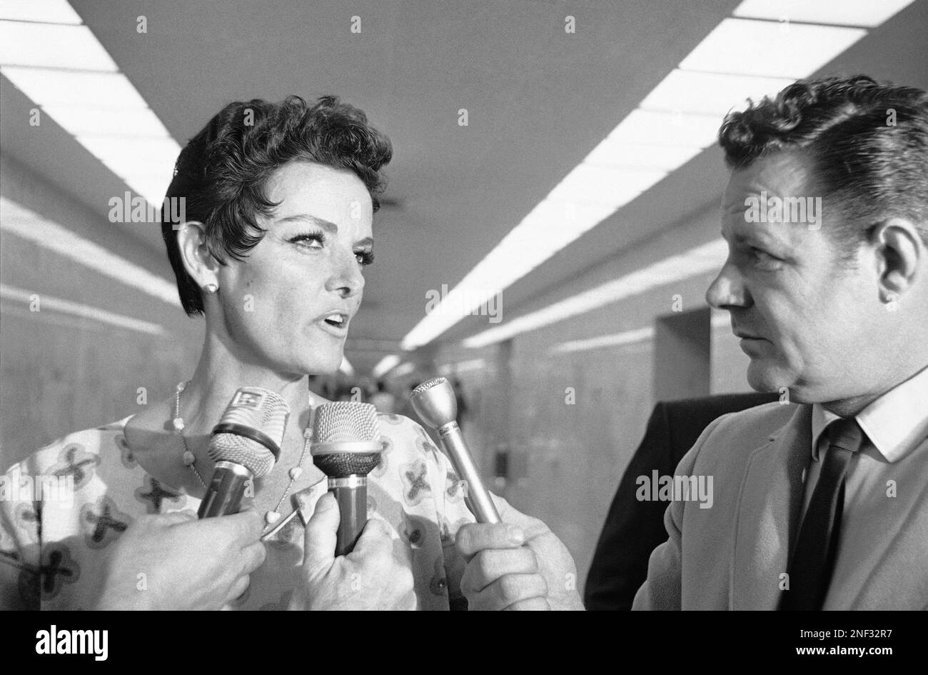 Actress Jane Russell talks to newsmen in Los Angeles, July 30, 1968 as ...