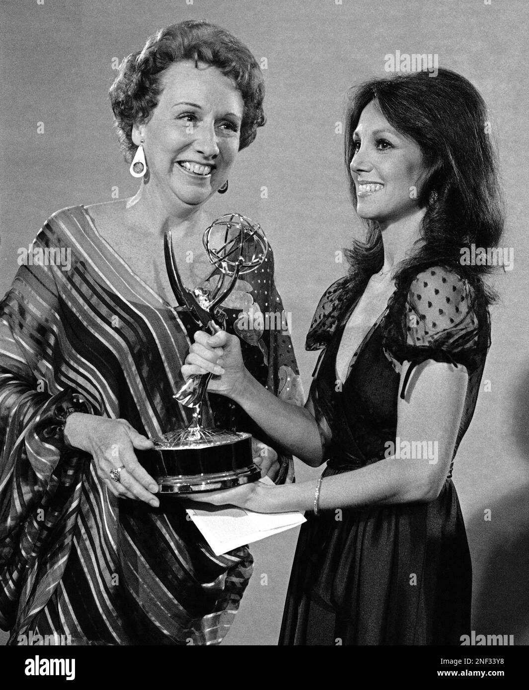 Actress Jean Stapleton (left) accepts the Emmy she won at night, Sunday ...