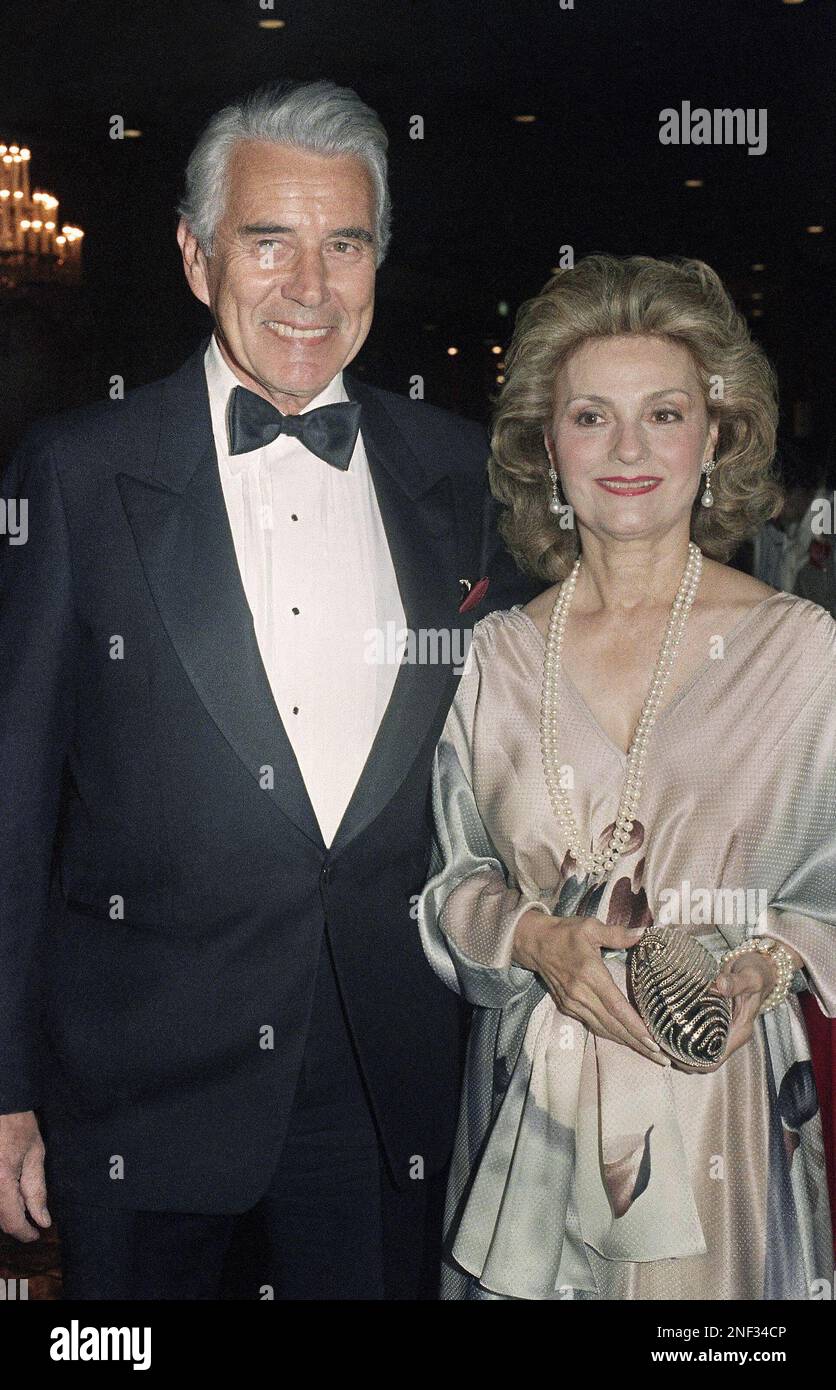 John Forsythe with his wife Julie, at a Hollywood party, Oct. 10, 1984 ...