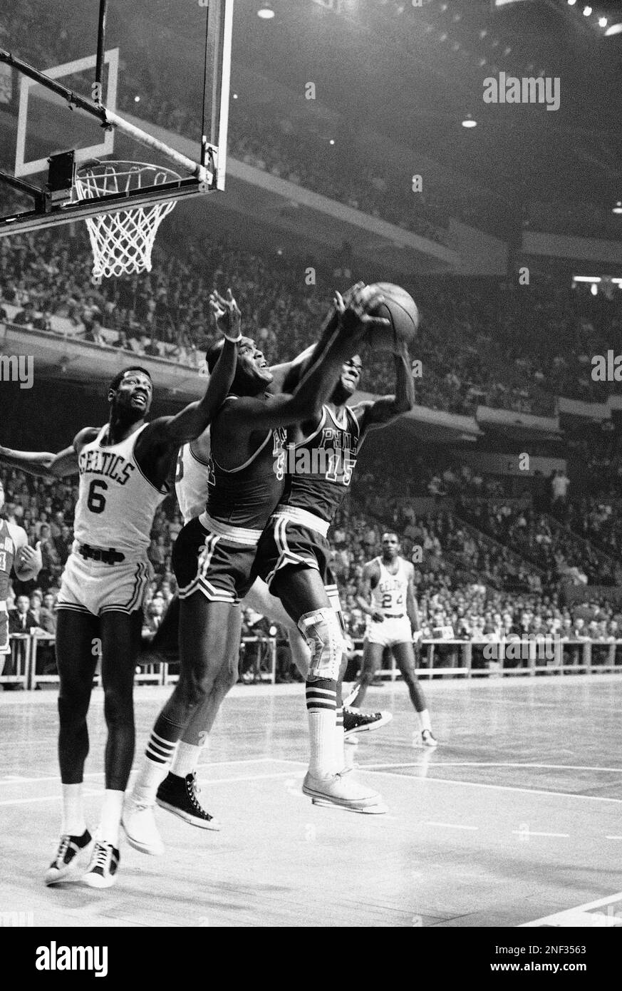 Lucious Jackson and Hal Greer (15) of the Philadelphia 76ers are shown ...