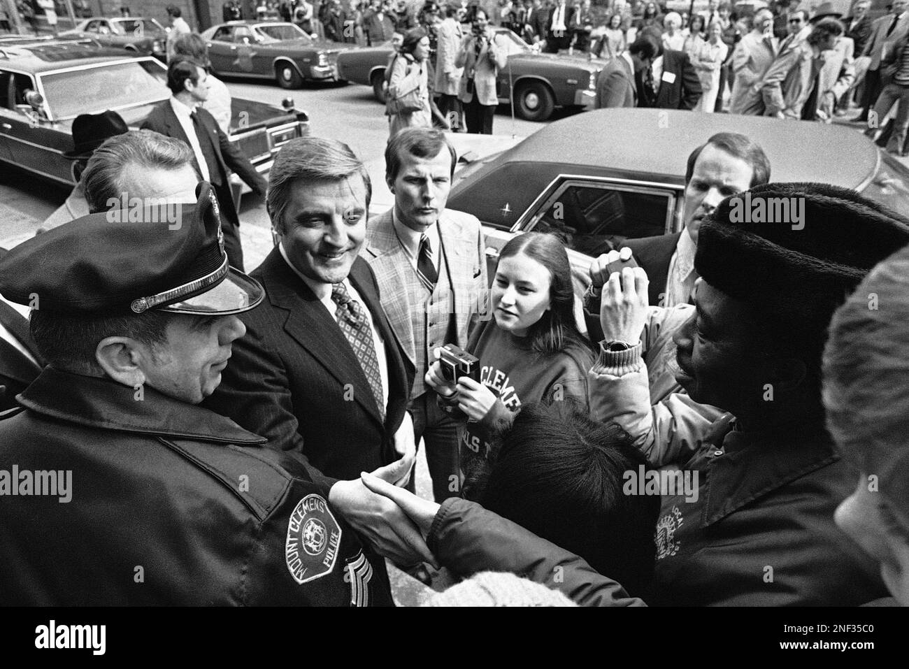 Vice President Walter Mondale shakes hands in downtown Mt. Clemens ...