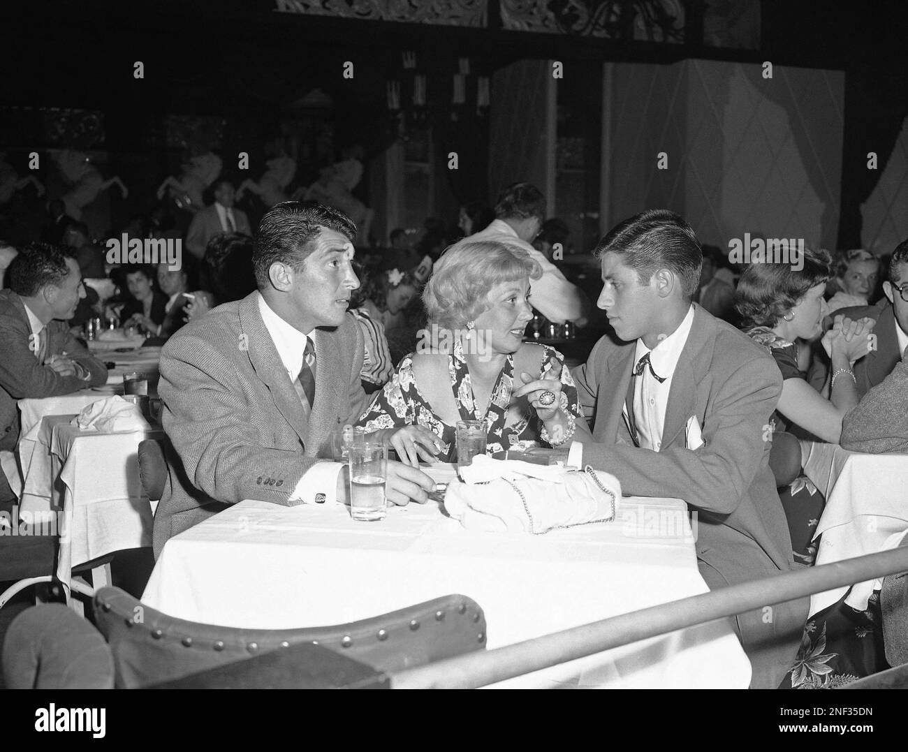 On a visit to Slapsy Maxie's Hollywood night club, actress Ann Sothern ...
