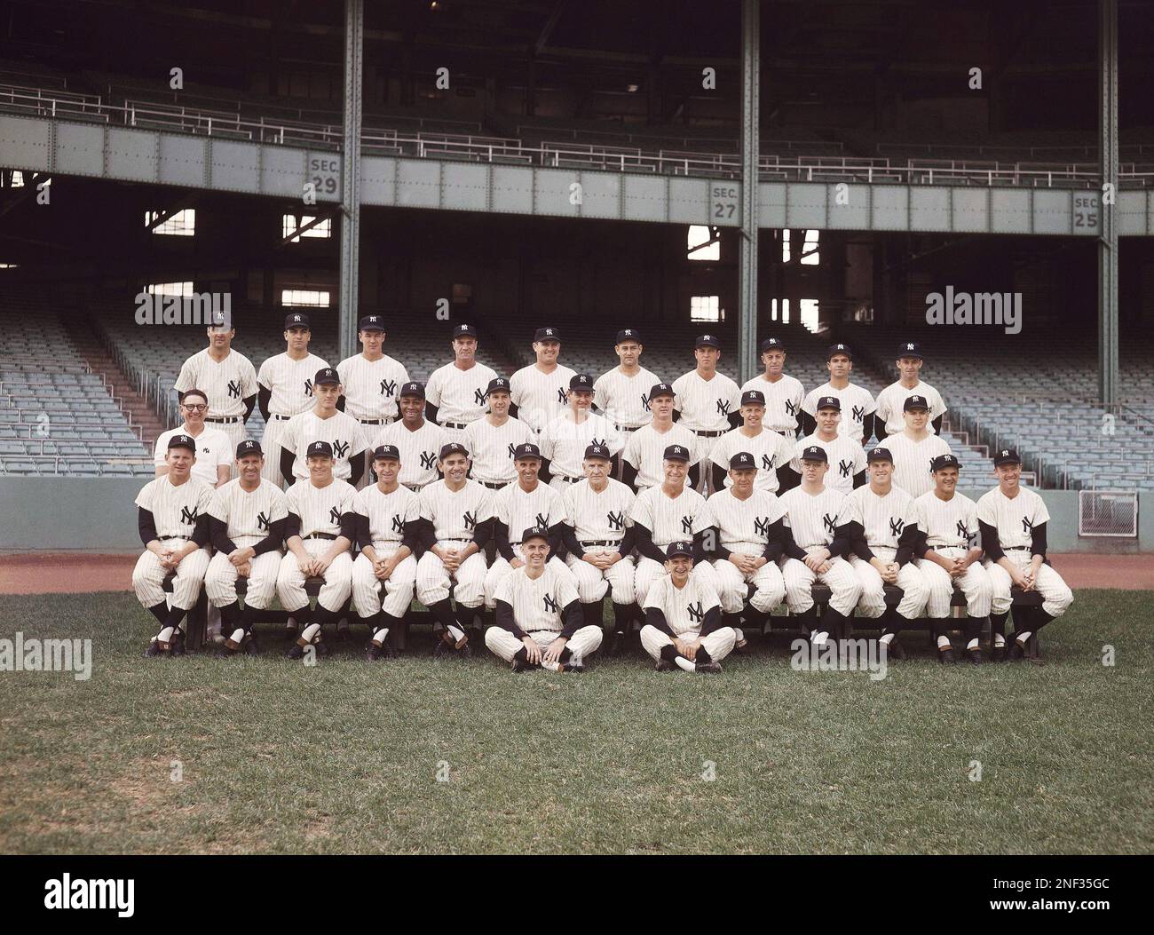 The New York Yankees team pose for a group portrait, 1958. From left to ...