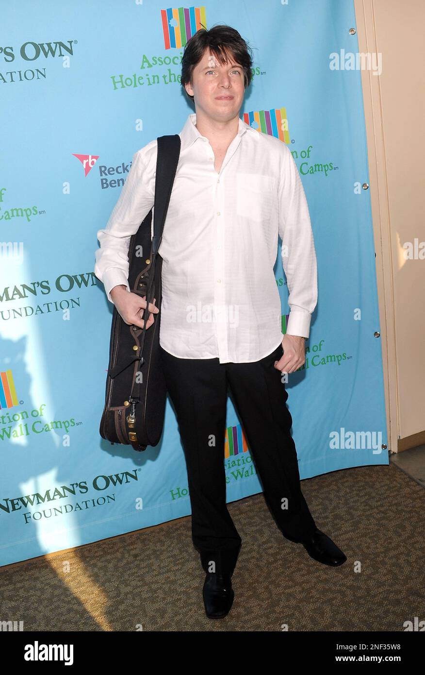 Musician Joshua Bell attends a celebration of Paul Newman's Hole in the ...