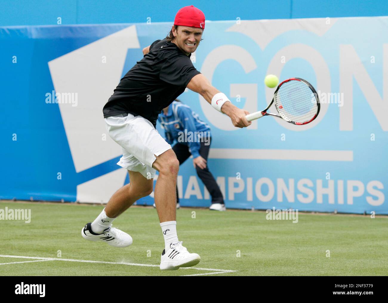 Robert Kendrick of U.S. plays a return to Feliciano Lopez of Spain ...