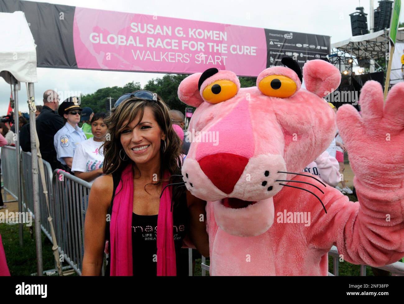 The Pink Panther and Country singer Candy Coburn show their support at the Susan G. Komen Global ...