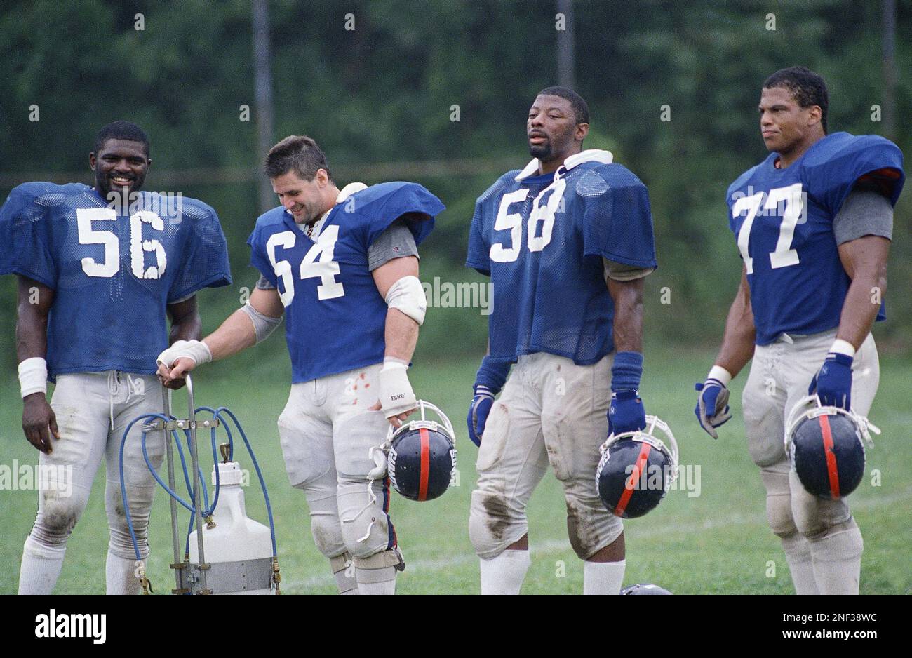 New York Giants, from left, Lawrence Taylor, Jim Burt, Carl Banks, and ...