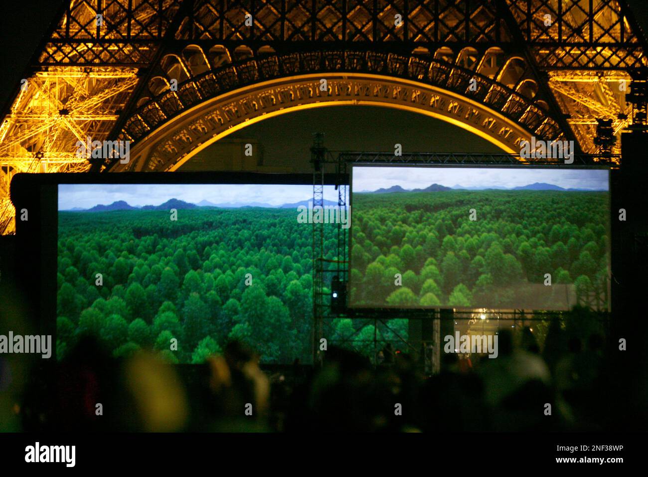 People watch French photographer Yann Arthus-Bertrand's movie "Home" on ...