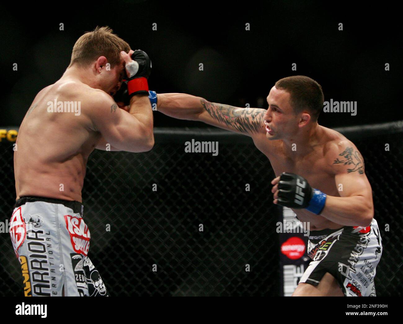 Frank Edgar, right, punches Sean Sherk during their UFC lightweight ...