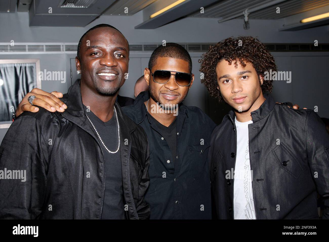 In this photo provided by StarPix, from left to right, Akon, Usher and ...