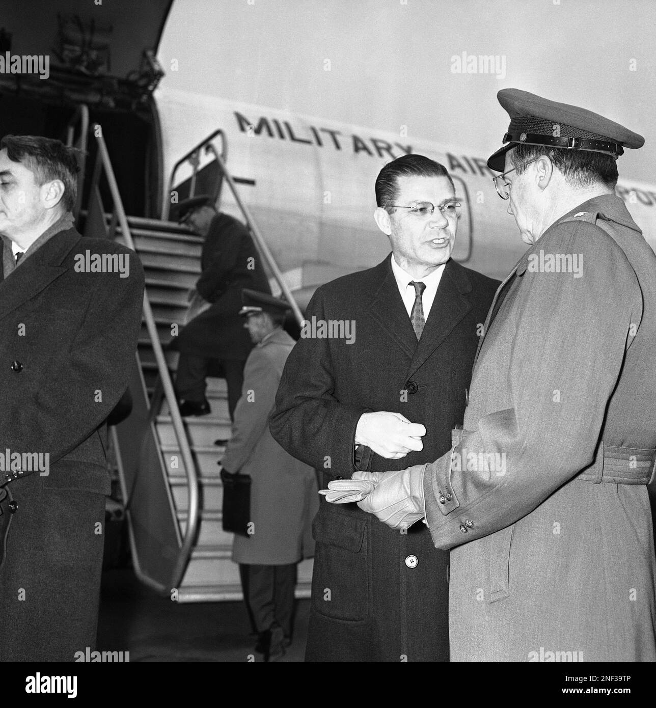 U.S. Defense Minister Robert McNamara, center, arrived at Orly Airfield ...