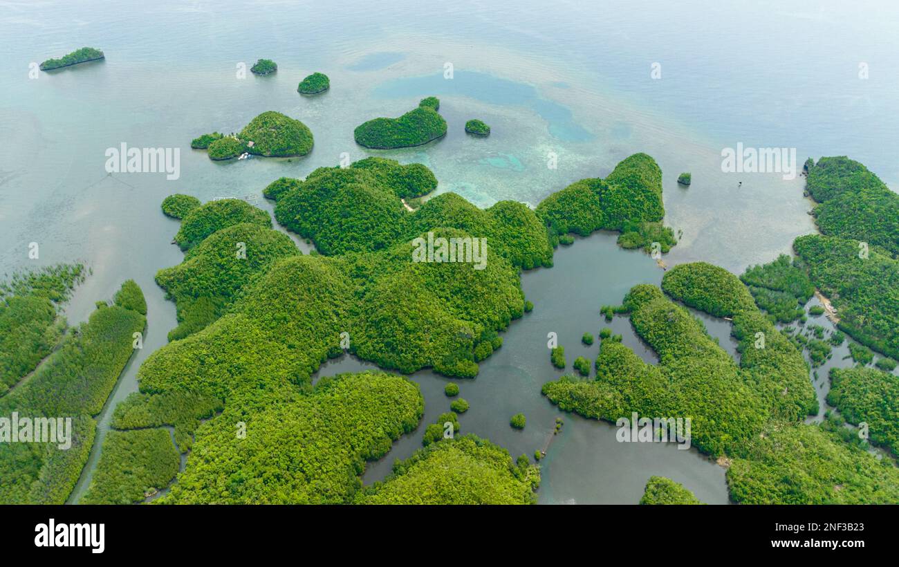 Aerial drone of tropical island in the cove. Clusters of islands in ...