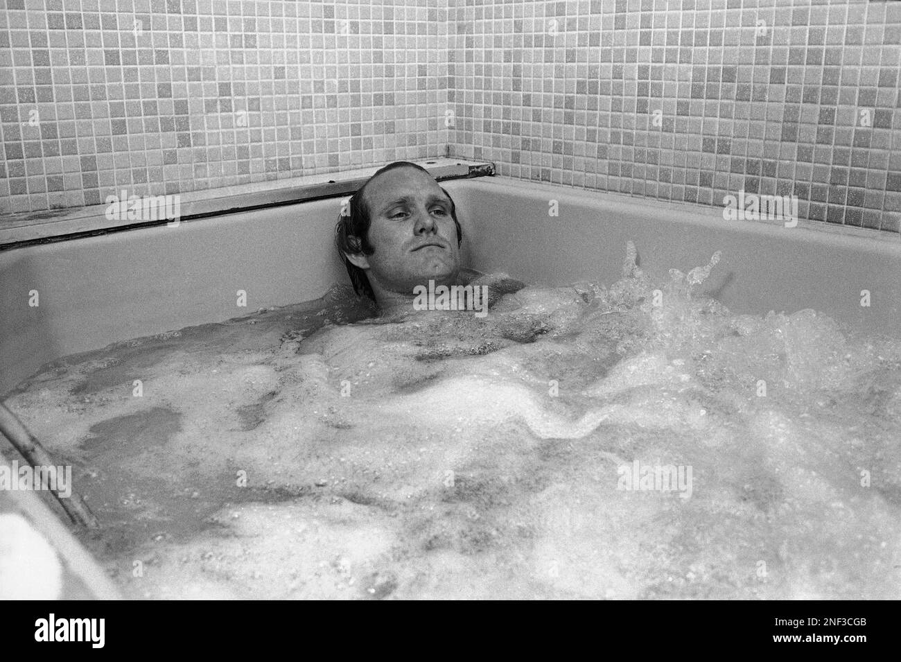 Pittsburgh Steelers quarterback Terry Bradshaw relaxes in a hot sudsy ...