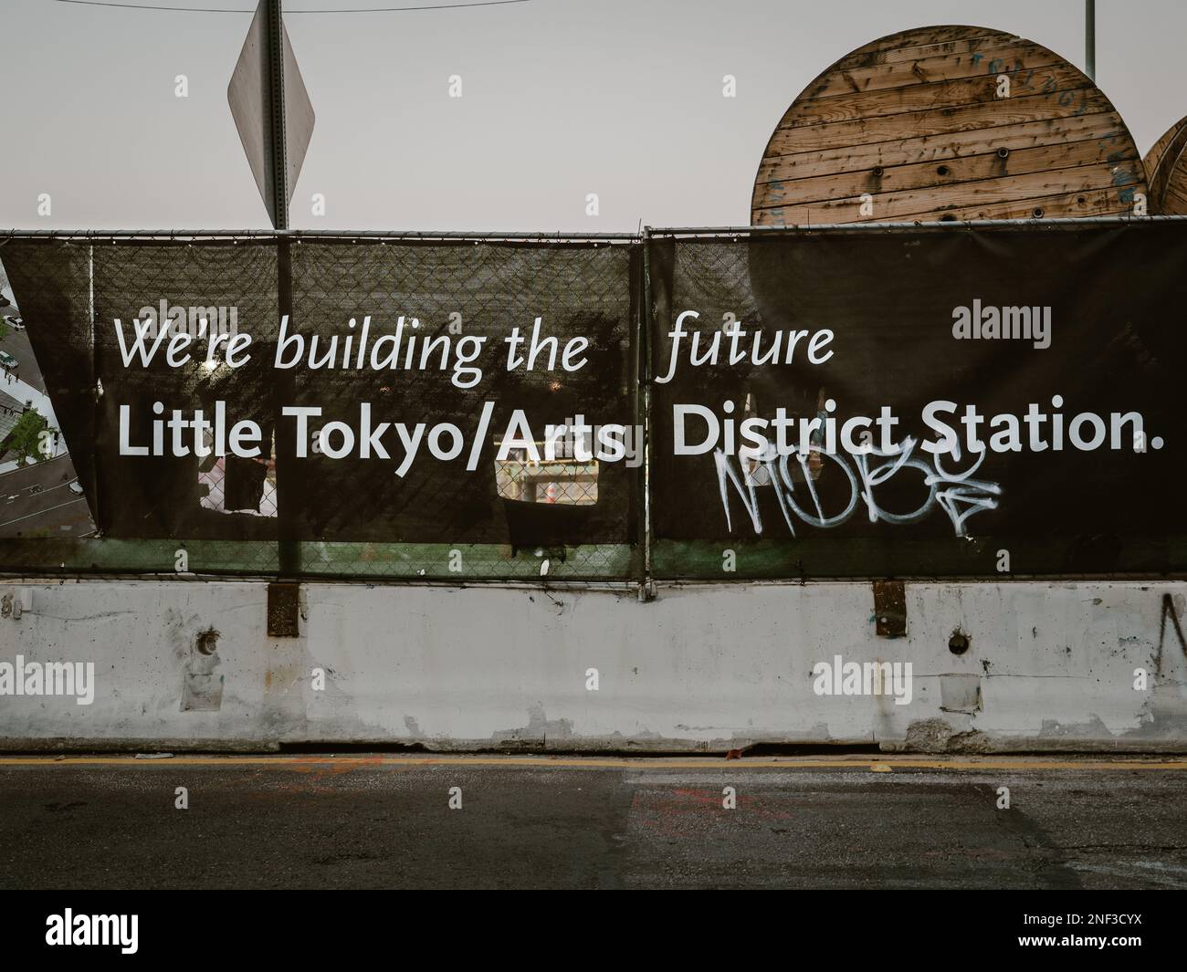 A poster written "we're building the future" on the streets of Los ...